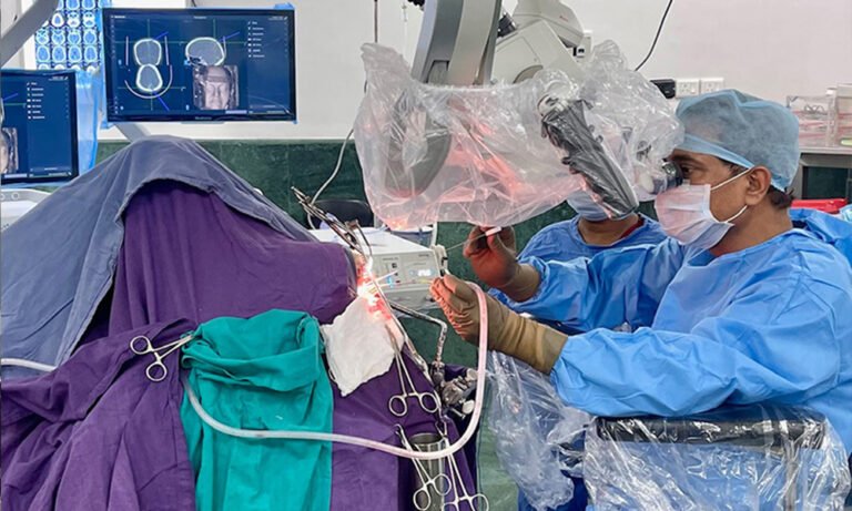Performing brain surgery using the most advanced operating microscope ...